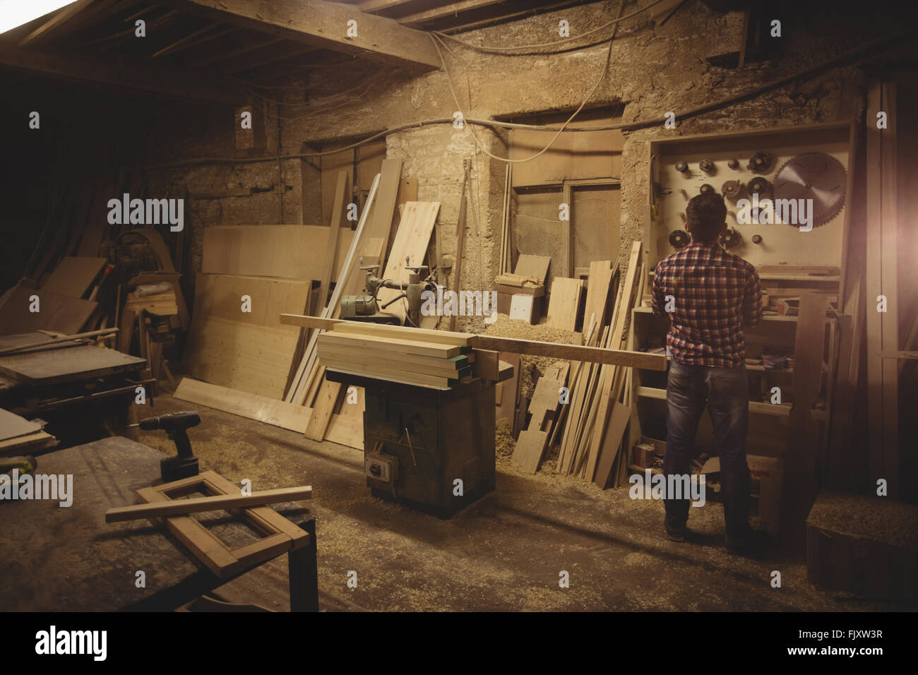 Carpenter working on his craft Stock Photo - Alamy