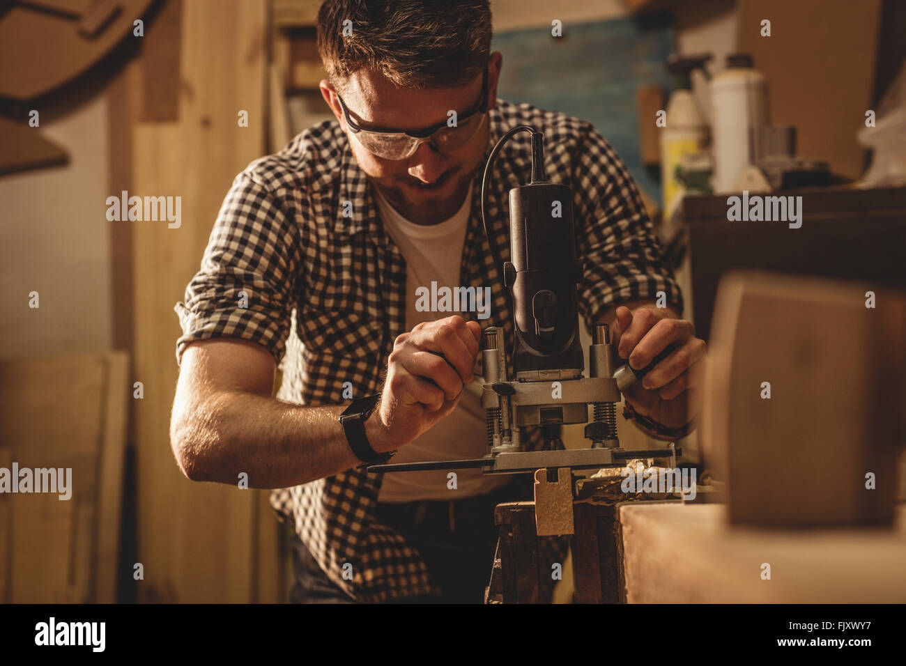 Carpenter working on his craft Stock Photo - Alamy