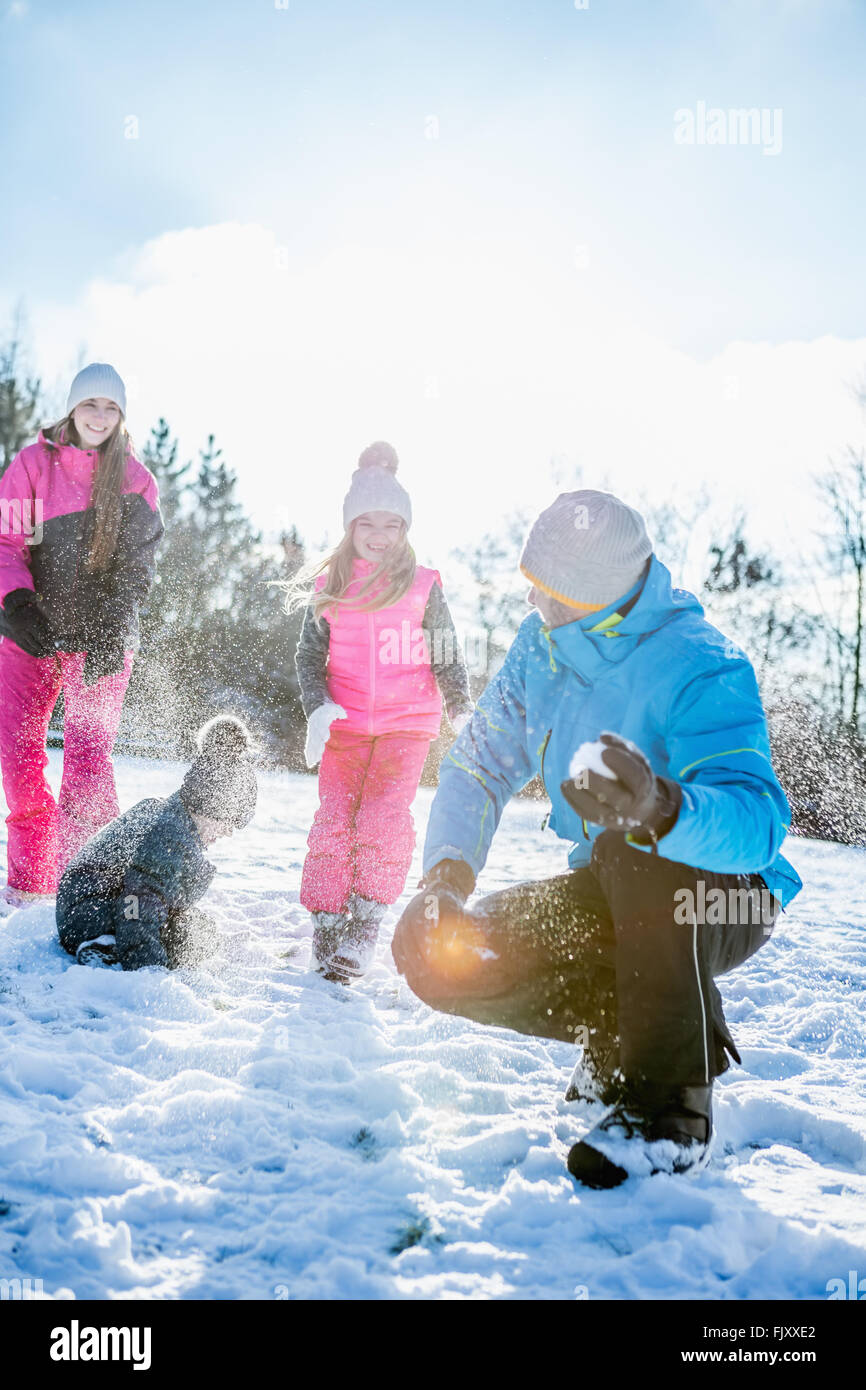 Snowball fight children hi-res stock photography and images - Alamy