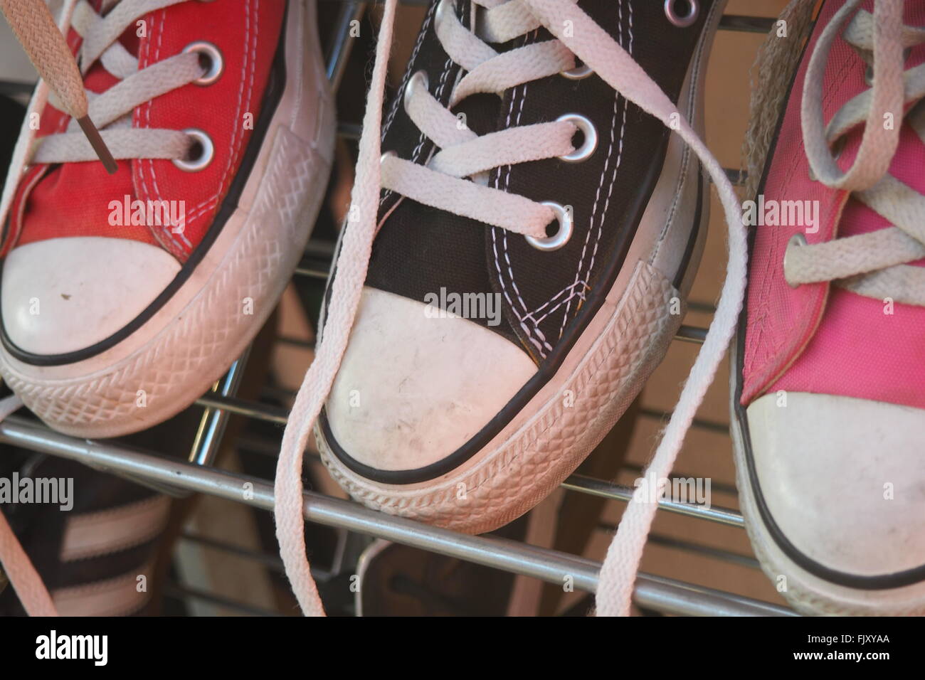 Shoes on rack hi-res stock photography and images - Alamy
