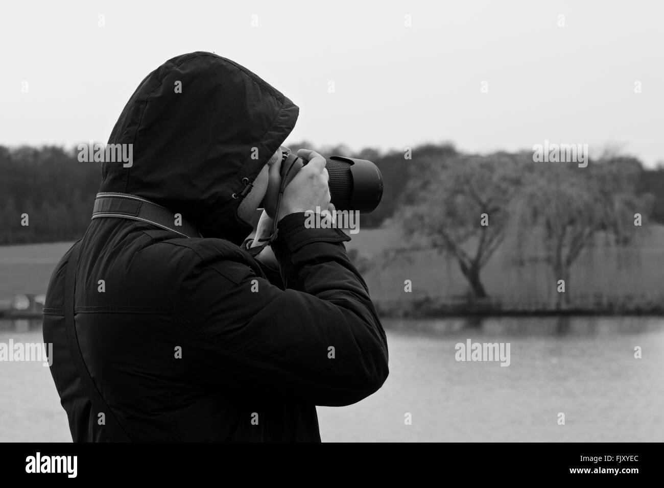 Camera hooded hi-res stock photography and images - Alamy