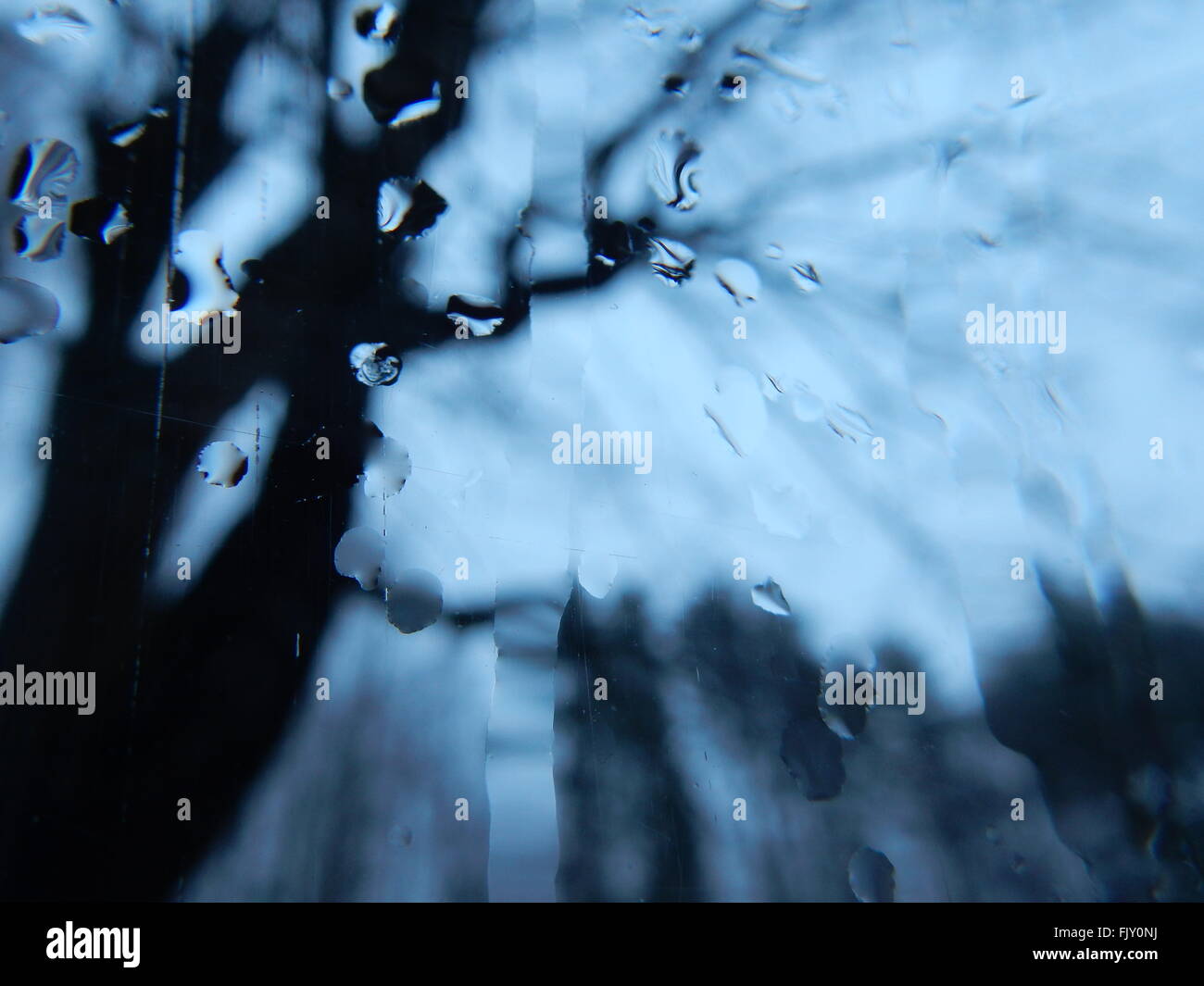 Wet Glass Window In Rainy Season Stock Photo - Alamy