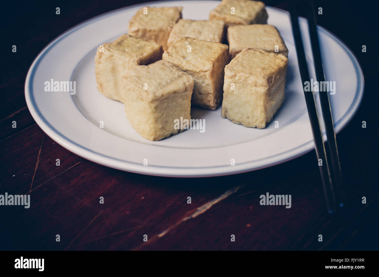 delicious fried Tofu and fish, Vintage color filter Stock Photo - Alamy