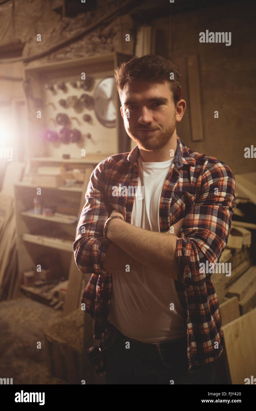 Carpenter smiling at the camera Stock Photo - Alamy
