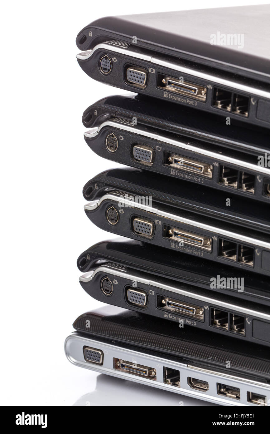 stack of old laptops awaiting repair isolated on white background Stock ...