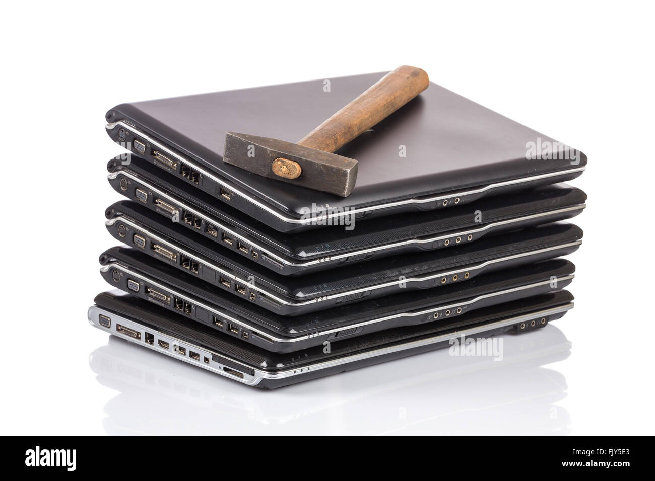 stack of old laptops awaiting repair isolated on white background Stock ...