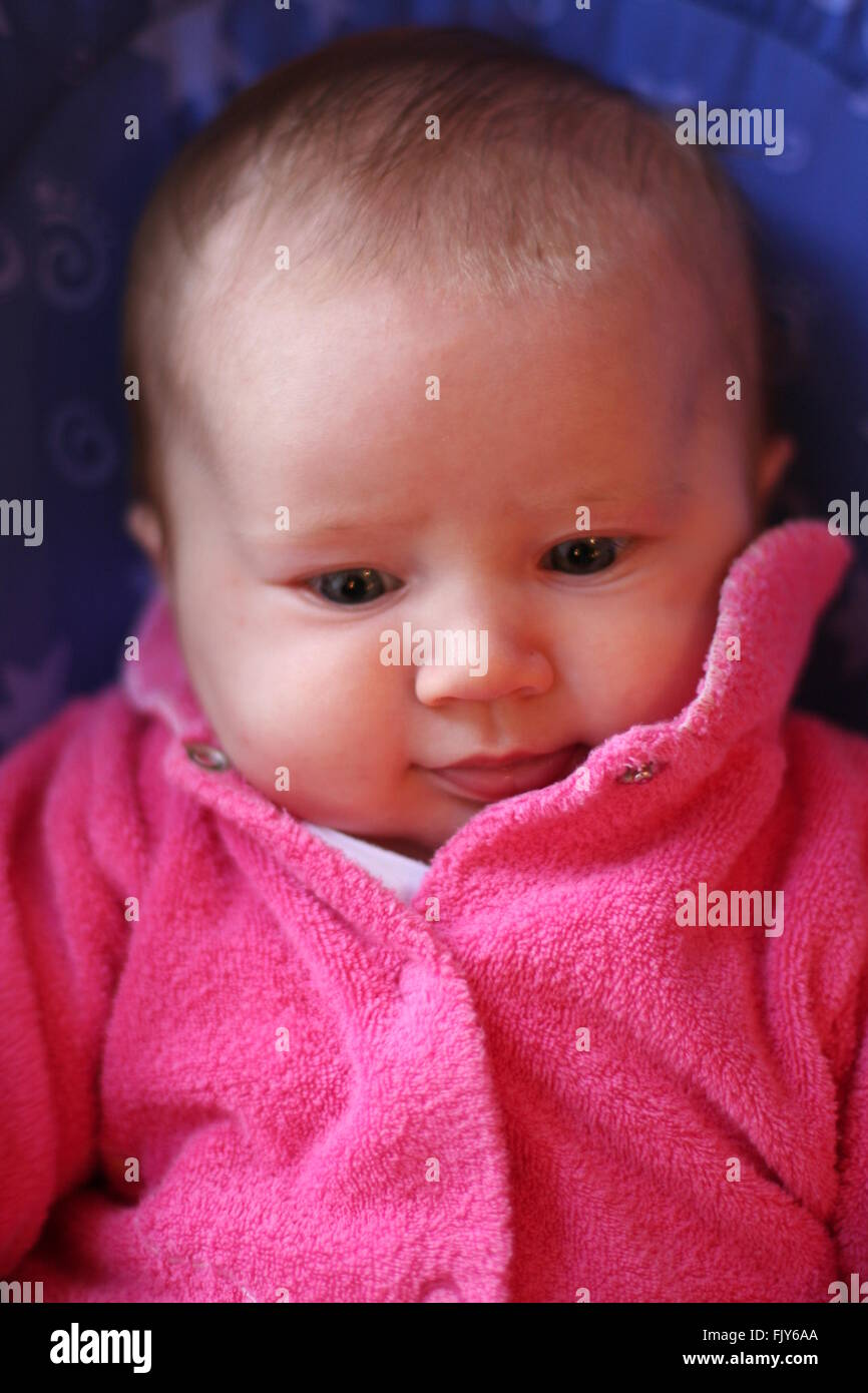 Baby girl chilling out Stock Photo - Alamy