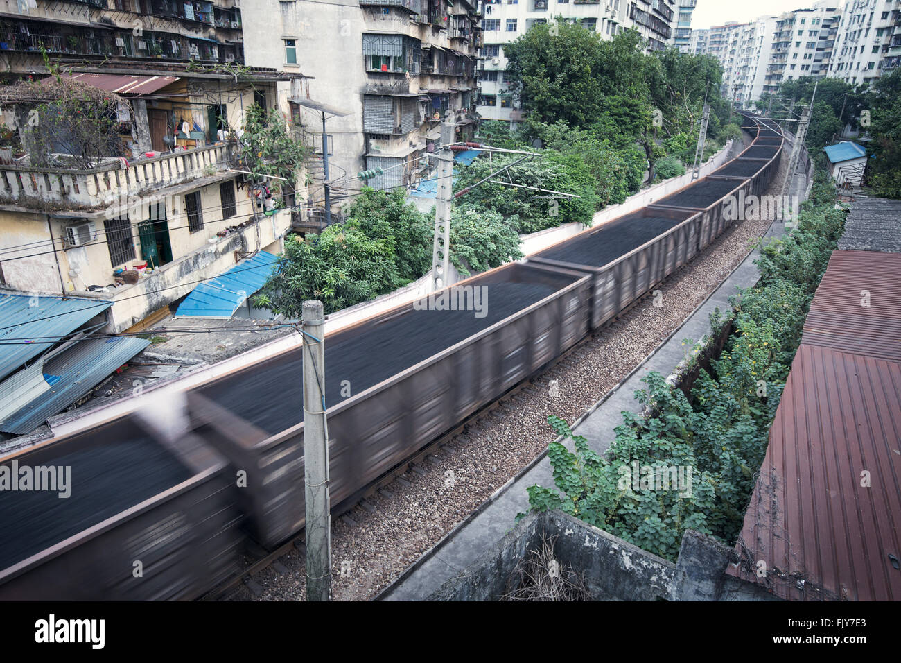 Train with coals running on the railway Stock Photo - Alamy