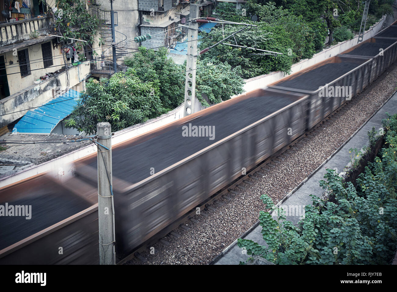 Train with coals running on the railway Stock Photo - Alamy
