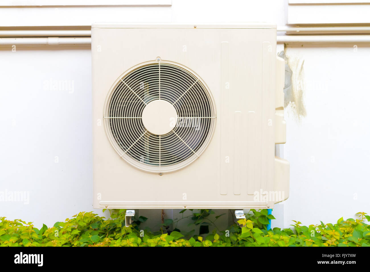 air condenser install at the wall Stock Photo - Alamy