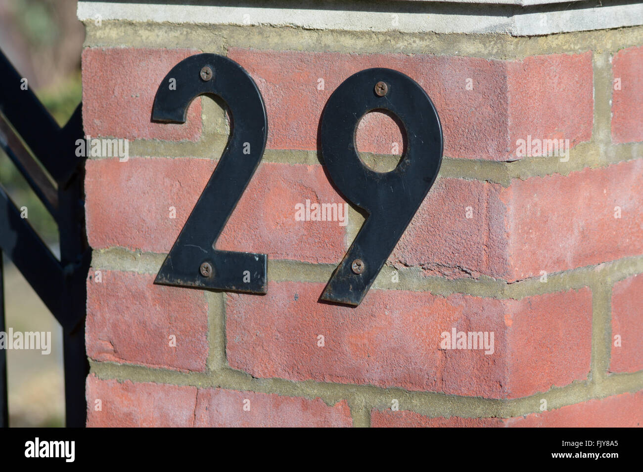 House number 29 sign on wall Stock Photo - Alamy