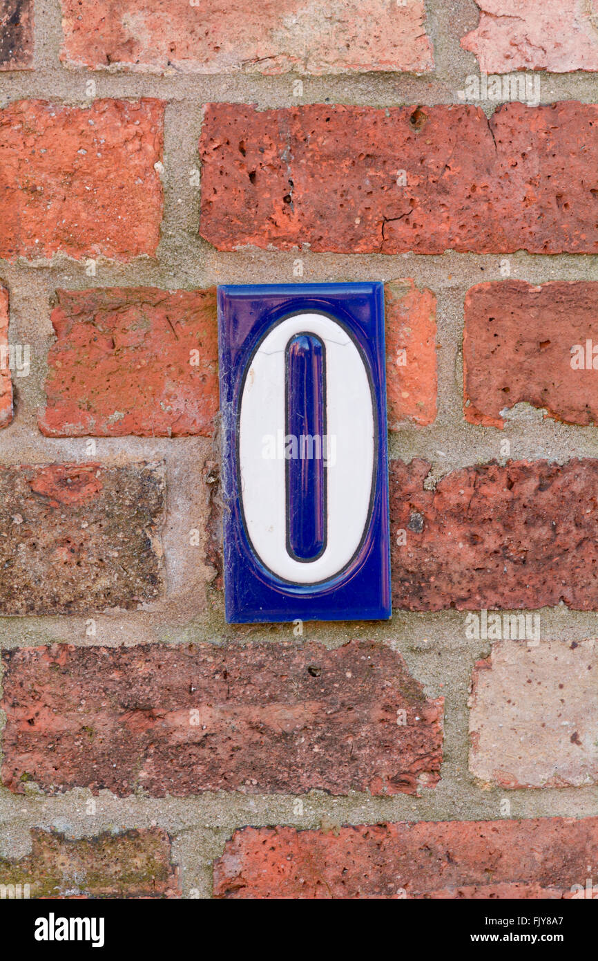 House number 0 sign on wall Stock Photo - Alamy