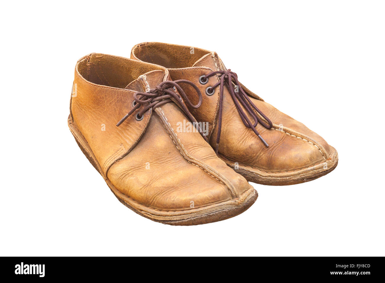 Old brown leather shoes isolate on a white background Stock Photo - Alamy