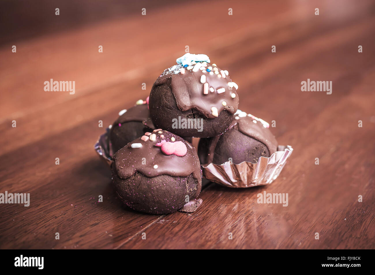 Chocolate balls topping with a sugar resin. Vintage color tone Stock ...