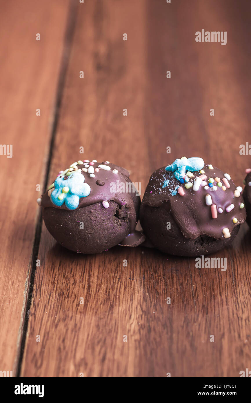 Chocolate balls topping with a sugar resin. Vintage color tone Stock ...