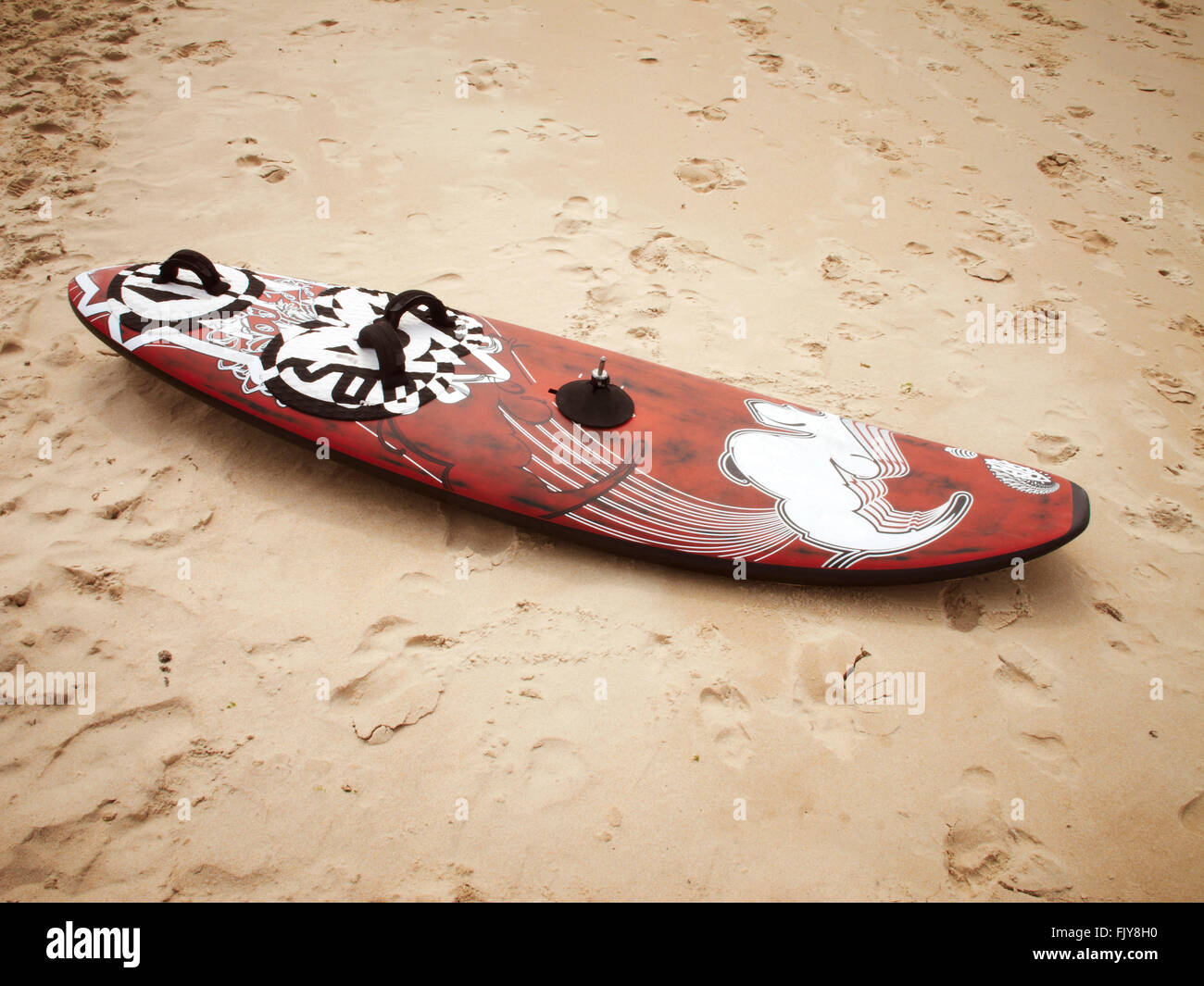Surfboard on a Mediterranean beach in warm tone. Horizontal Stock Photo ...