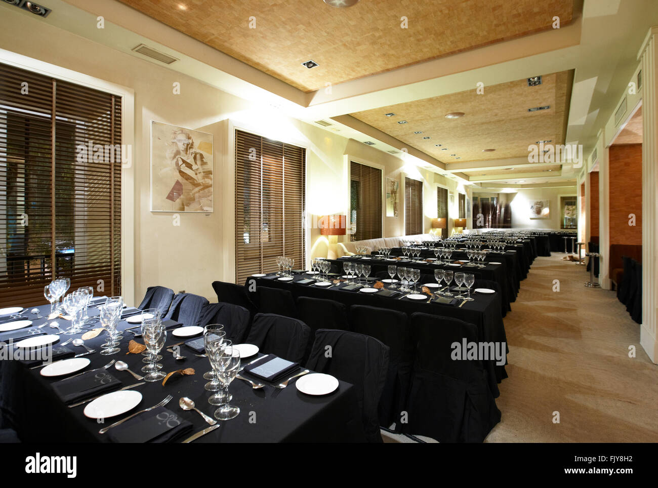 Black decorated tables in a restaurant at night. Horizontal Stock Photo ...