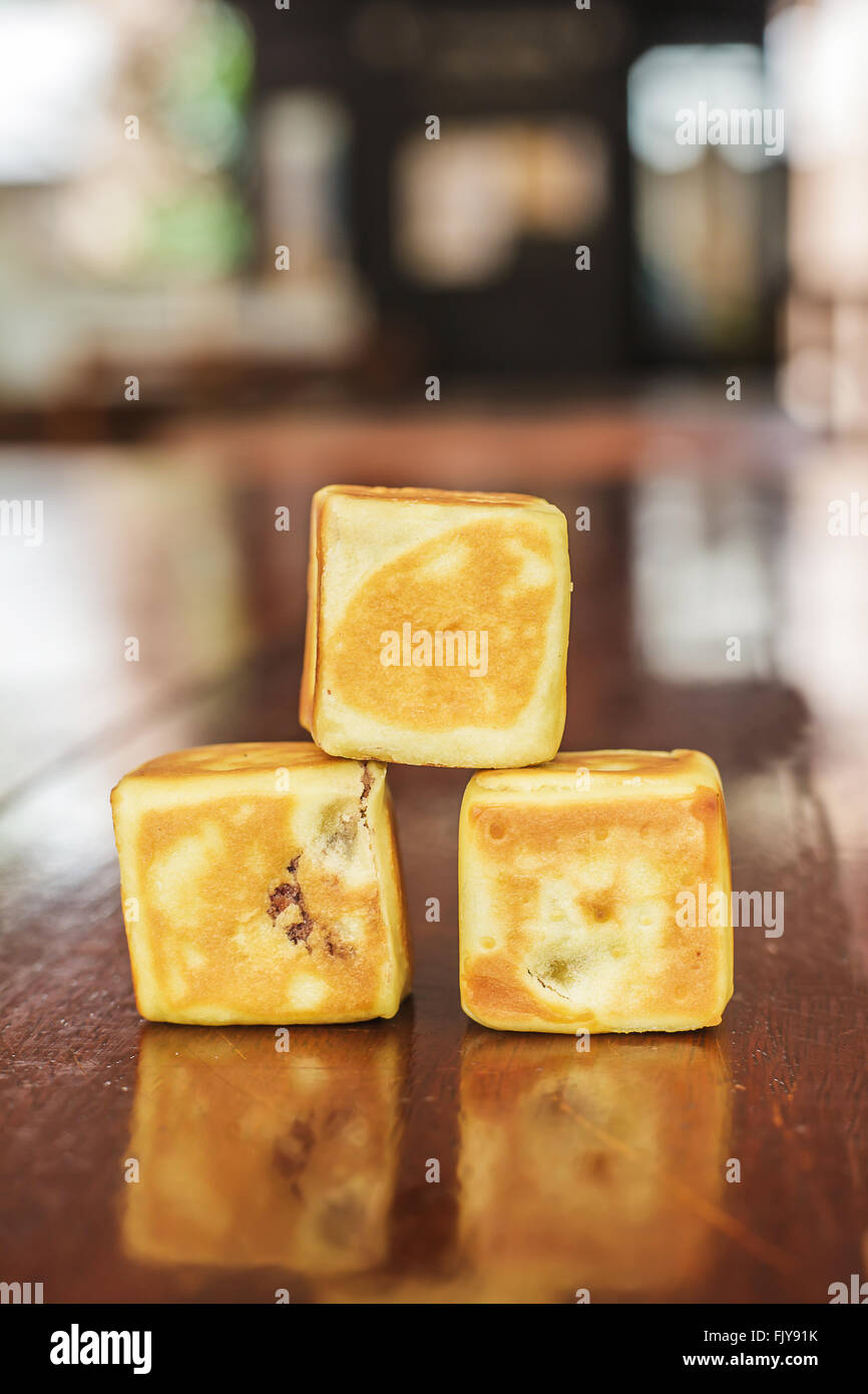Close up of cube red bean bun Stock Photo - Alamy