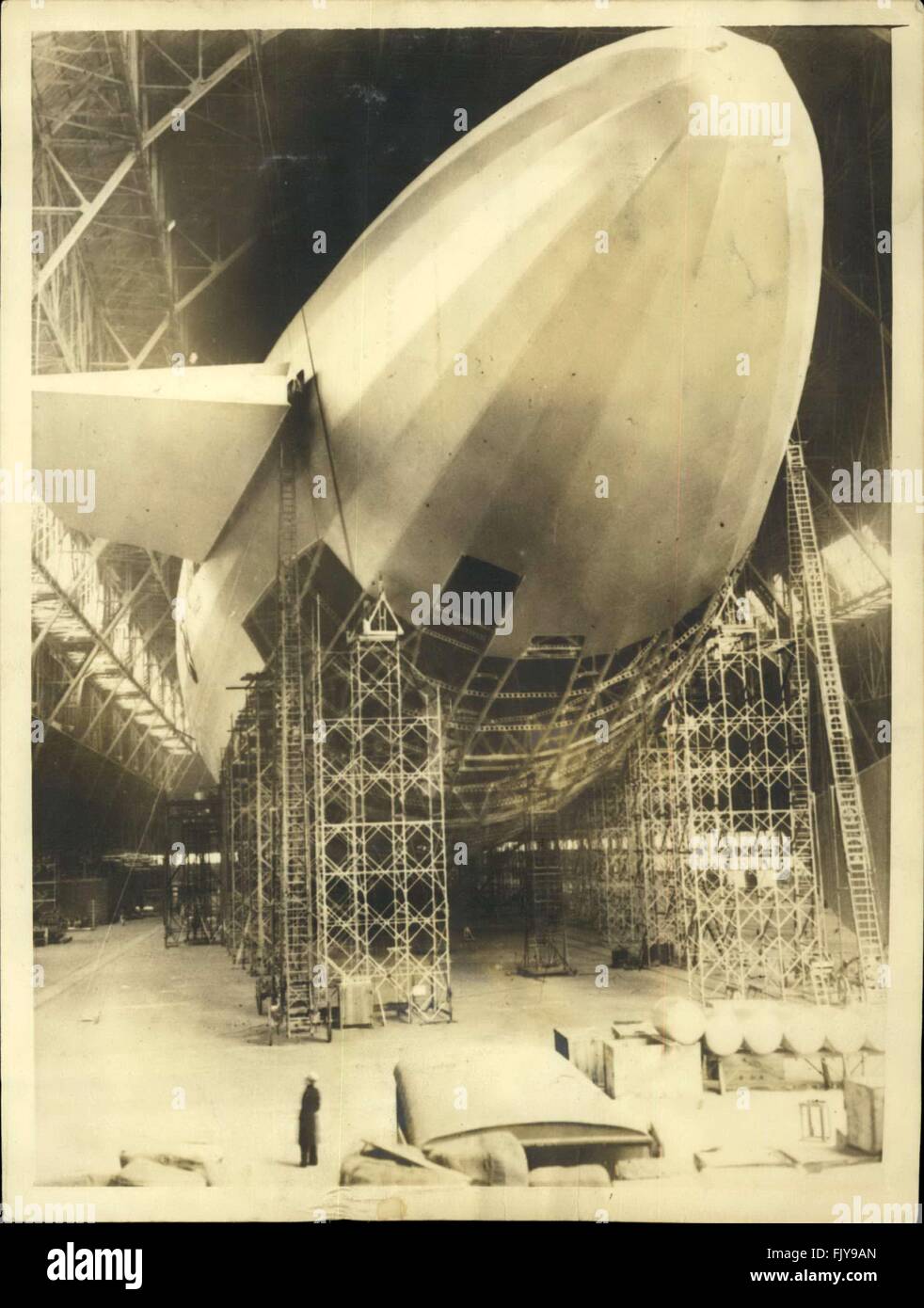 1934 - Navy's New Armed Dirigible Nears Completion. Workmen are shown ...