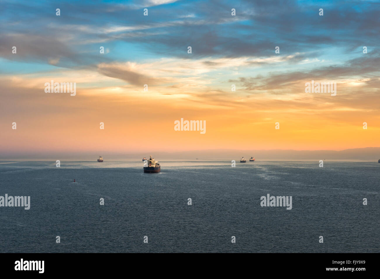Container ship during sunset hi-res stock photography and images - Alamy
