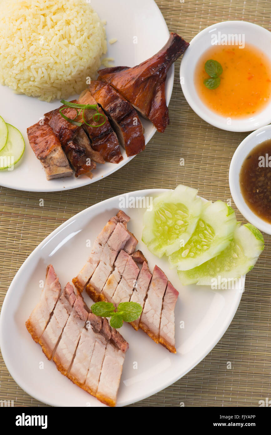 BBQ duck over steamed rice Stock Photo - Alamy