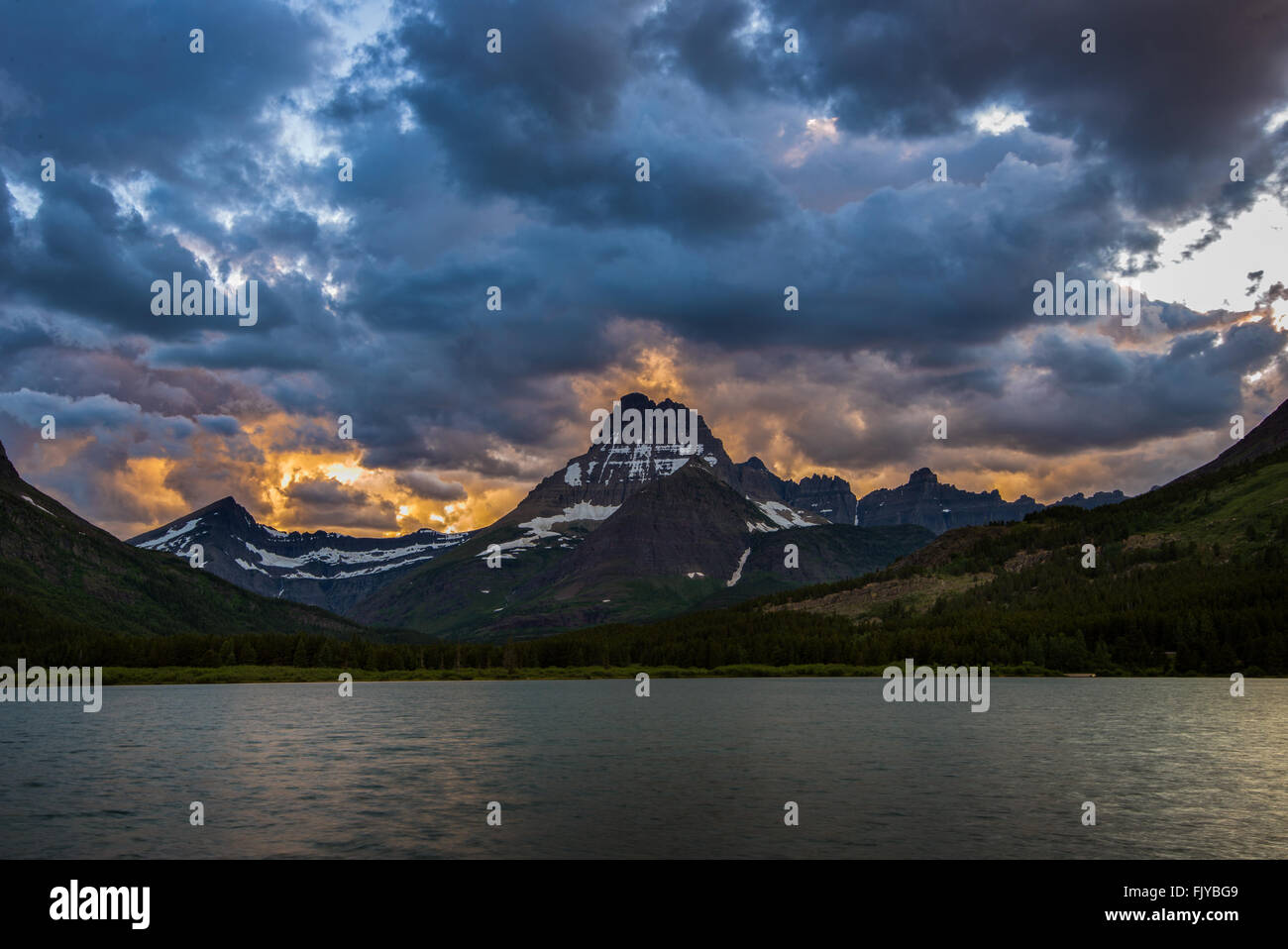 Beautiful sunset with Swiftcurrent Lake, Glacier National Park Stock ...