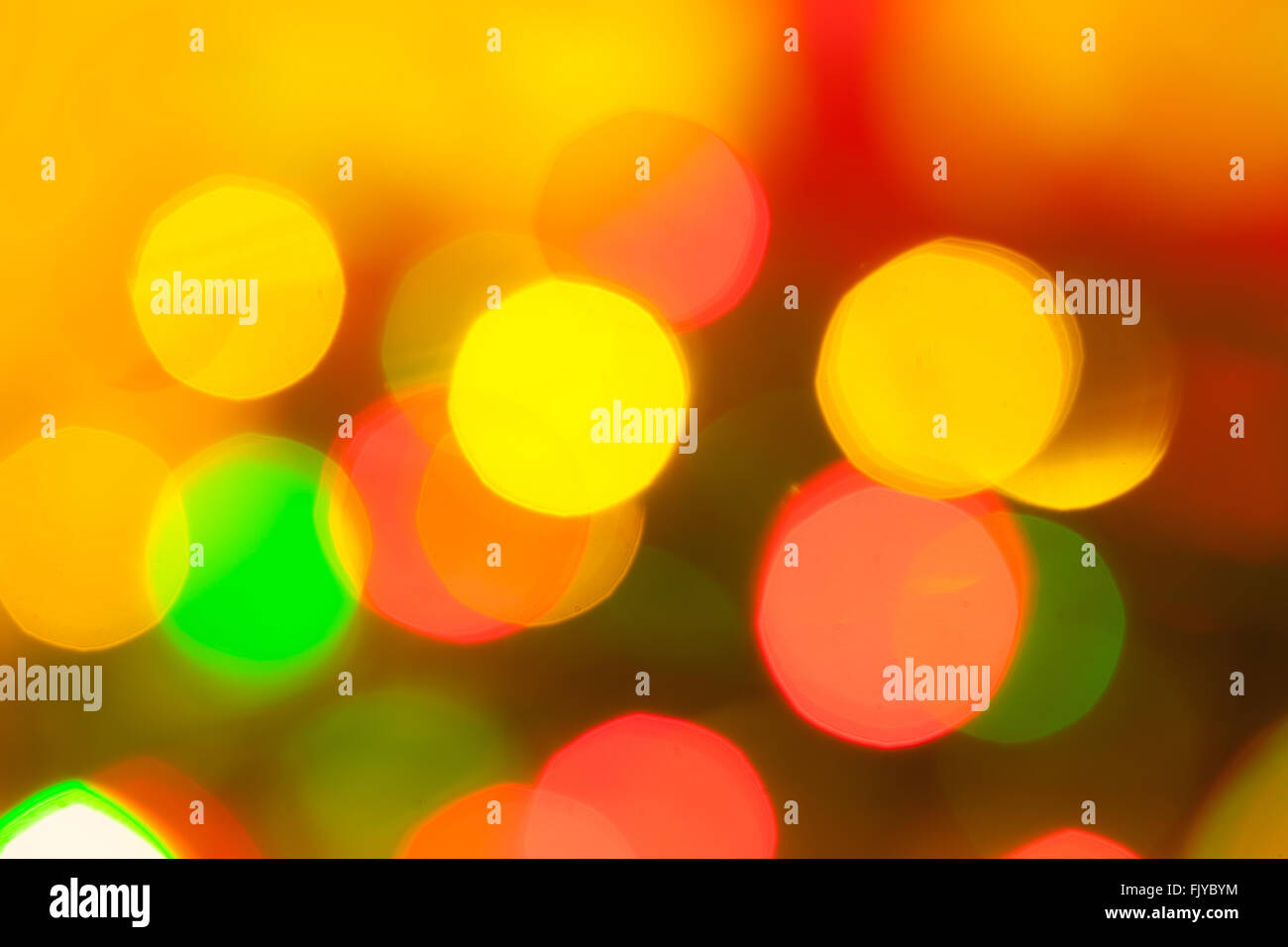 lots of colorful blurry glare in yellow tones Stock Photo - Alamy