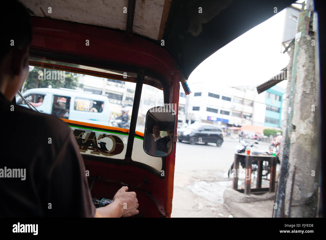 Rear View Of Man Driving Auto Rickshaw Stock Photo - Alamy