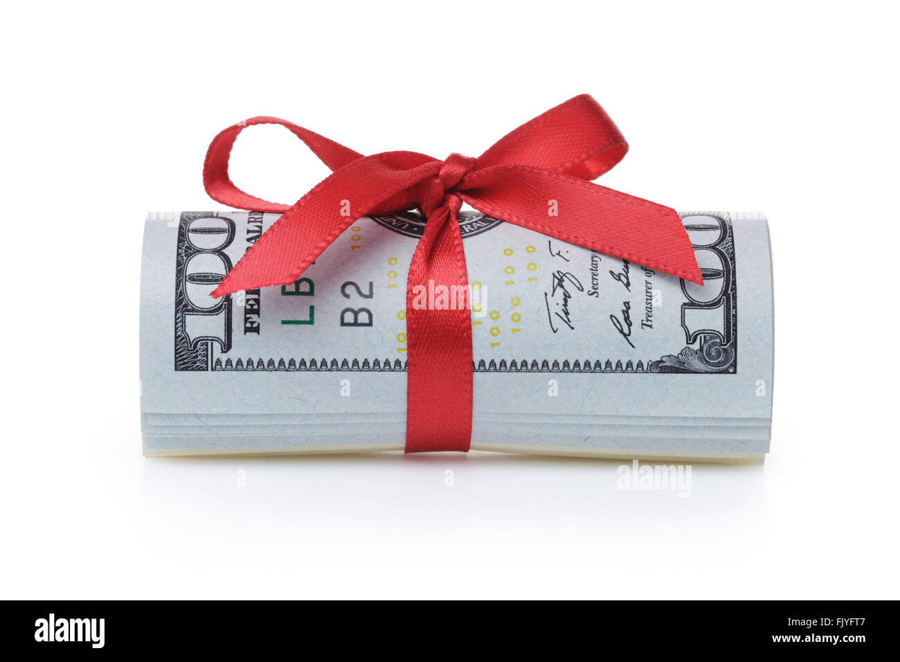 us dollars rolled and tied with red ribbon Stock Photo - Alamy
