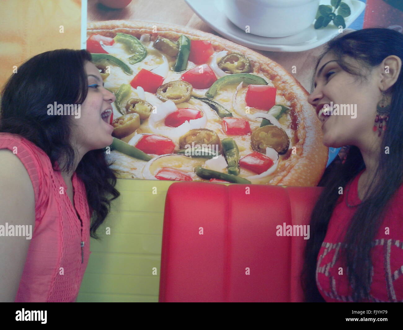 Women friends restaurant pizza hi-res stock photography and images - Alamy