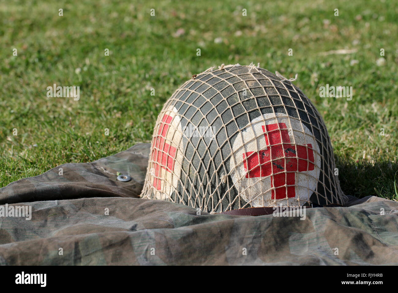 Red cross military helmet Stock Photo - Alamy