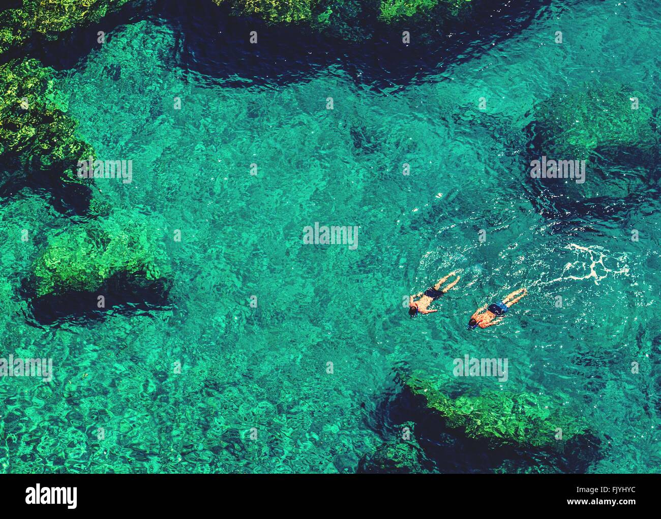 Two Men Swimming High Resolution Stock Photography and Images - Alamy