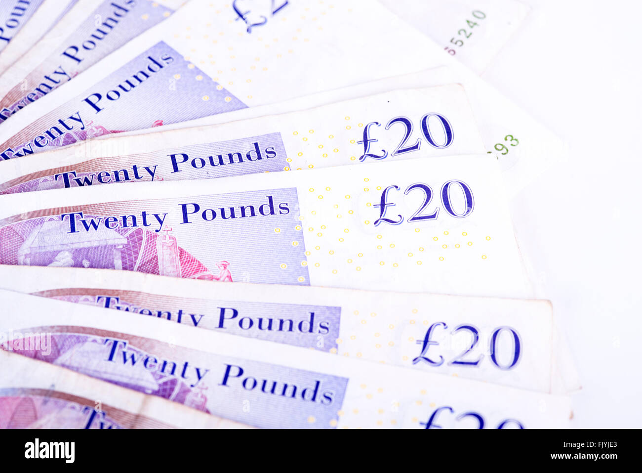 pictures of pounds banknotes on a white background Stock Photo - Alamy