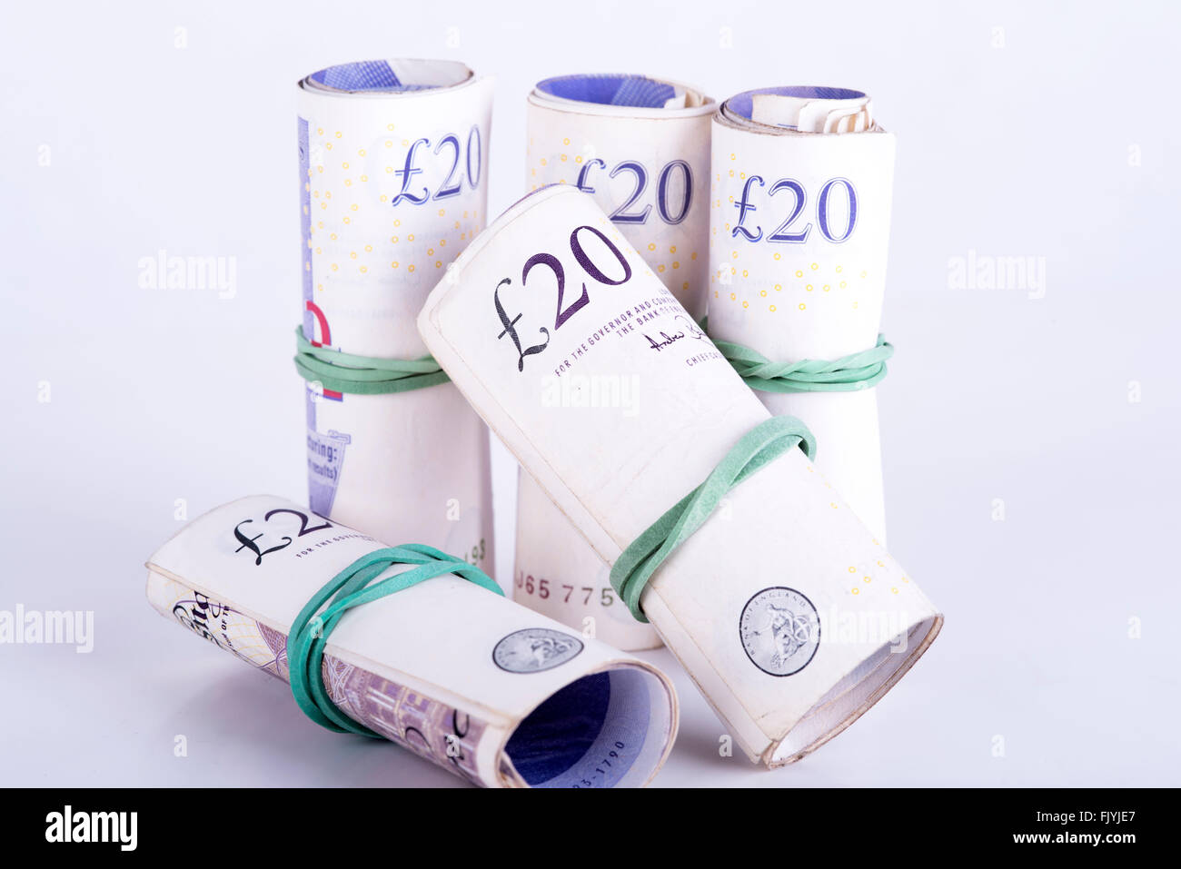 pictures of pounds banknotes on a white background Stock Photo - Alamy