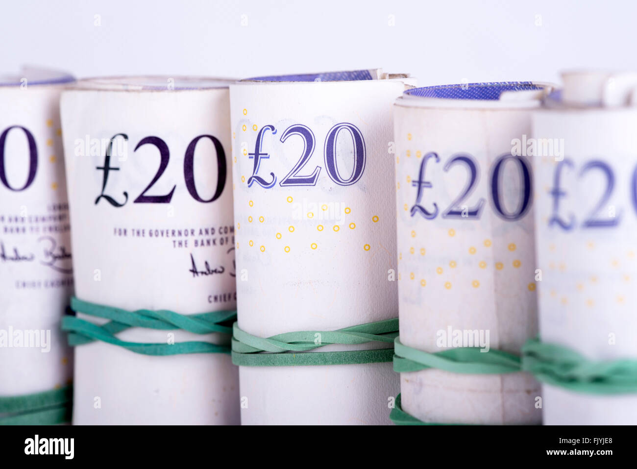 pictures of pounds banknotes on a white background Stock Photo - Alamy