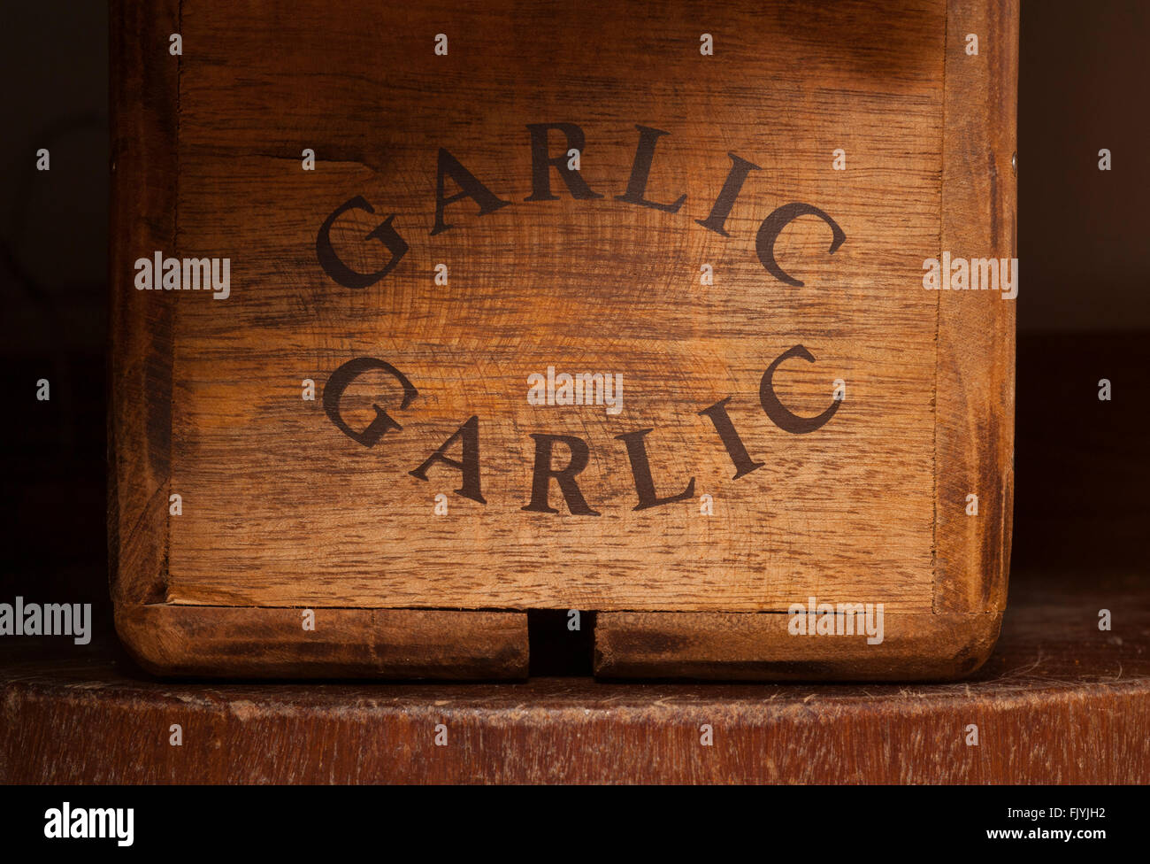 Wooden Garlic container Stock Photo - Alamy