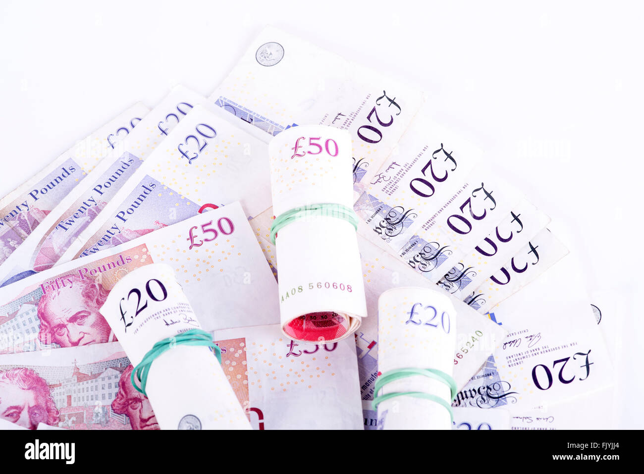 pictures of pounds banknotes on a white background Stock Photo - Alamy