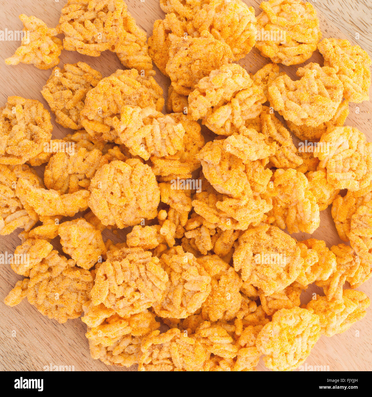 Spiced rice crispy isolated on white background Stock Photo - Alamy