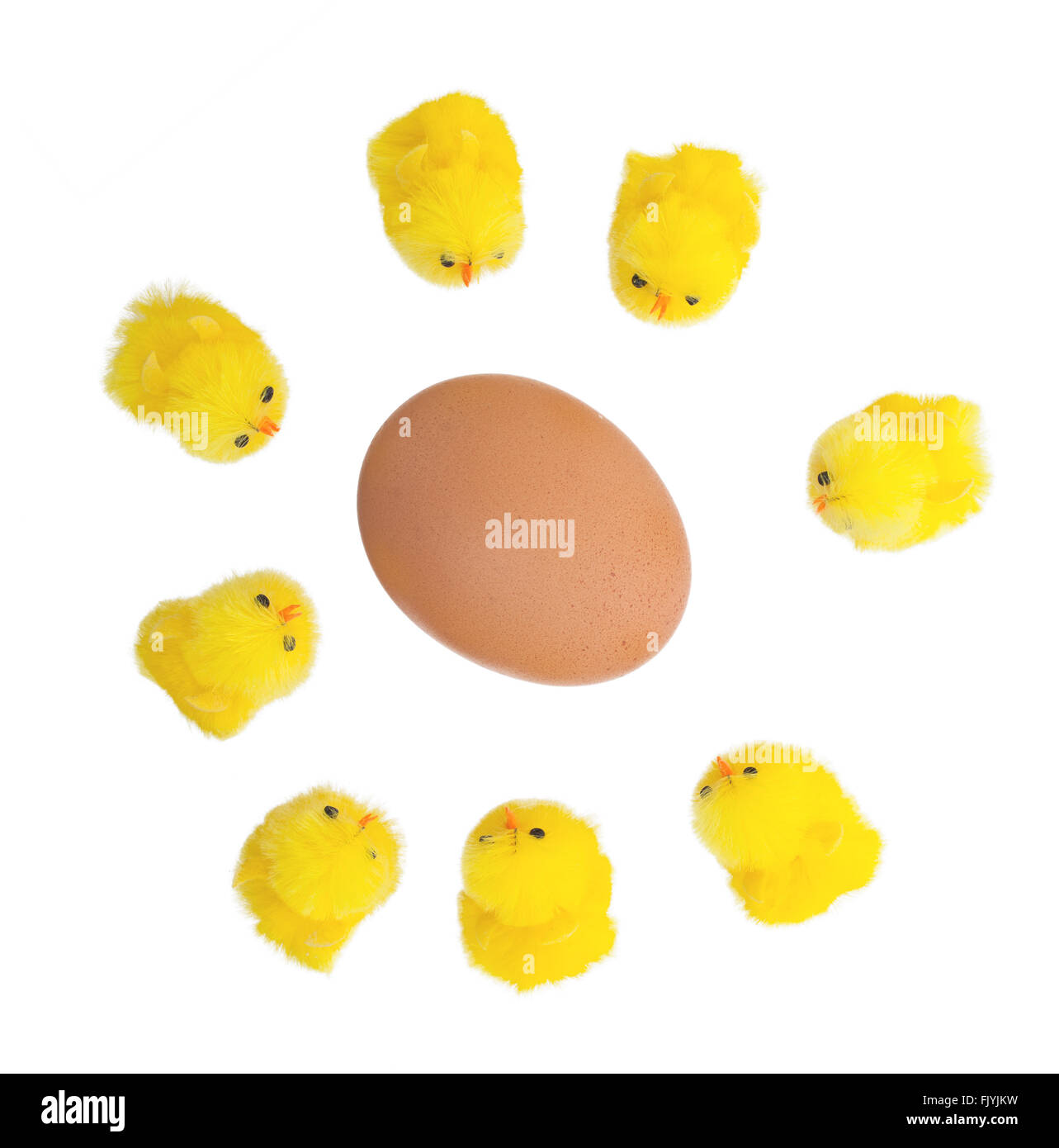 Easter chicks surrounding a large egg, isolated Stock Photo - Alamy