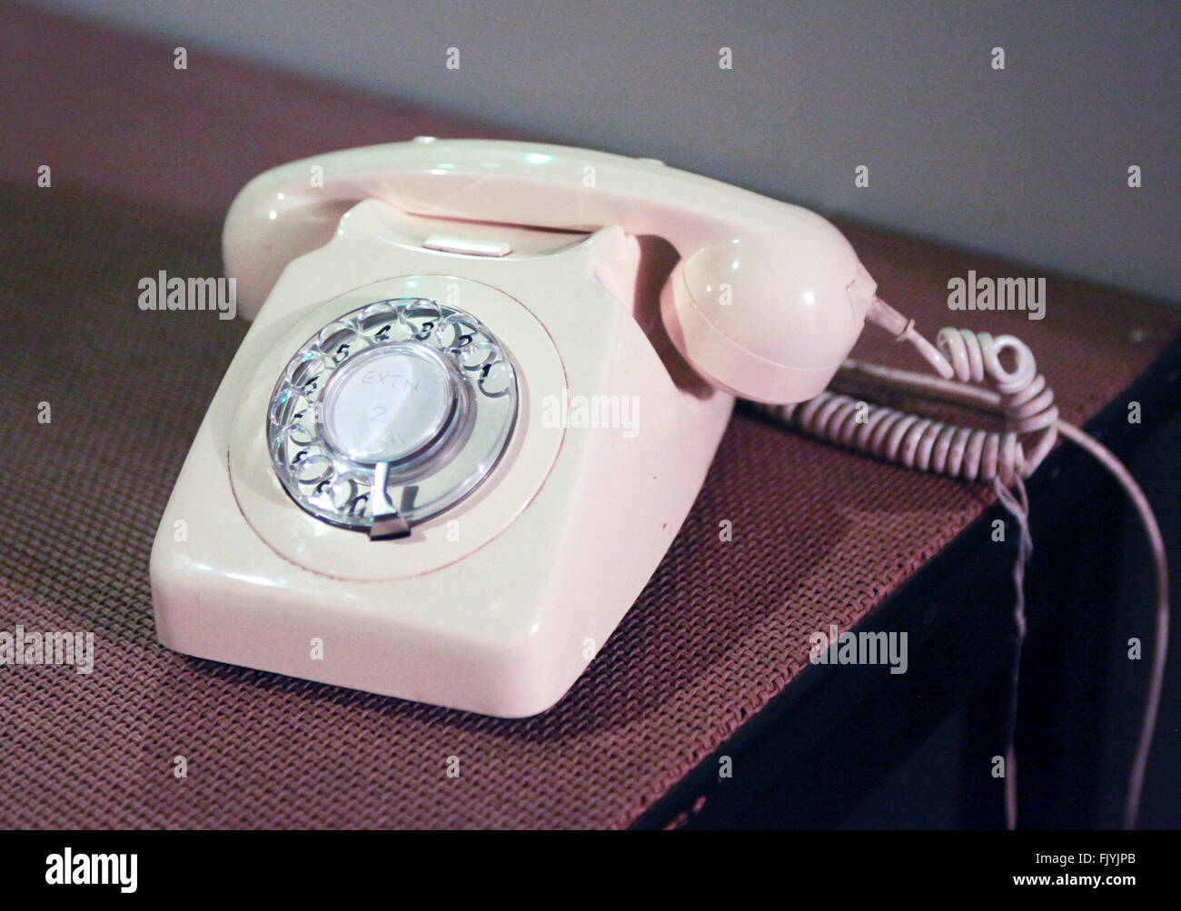 White rotating dial telephone from the seventies in retro style Stock ...