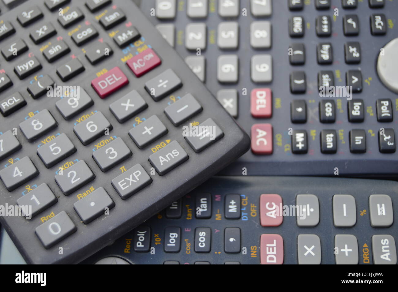 Electronic scientific calculators background Stock Photo - Alamy