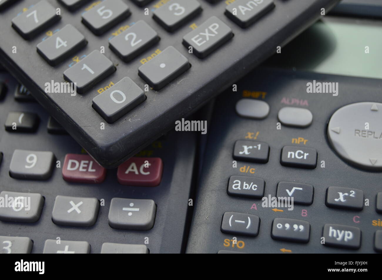 Electronic scientific calculators background Stock Photo - Alamy