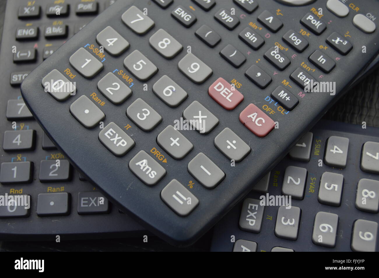 Electronic scientific calculators background Stock Photo - Alamy
