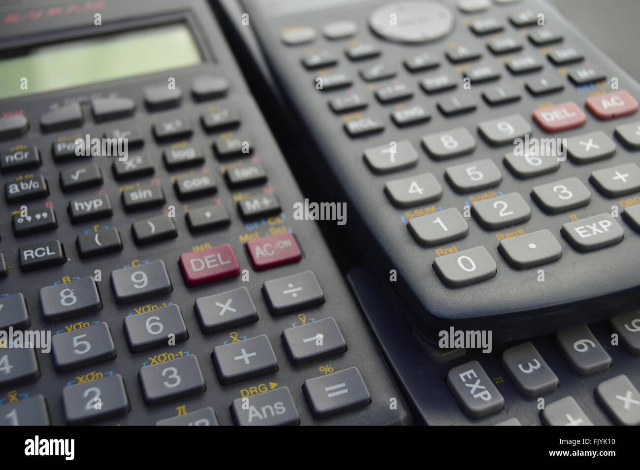 Electronic scientific calculators background Stock Photo - Alamy