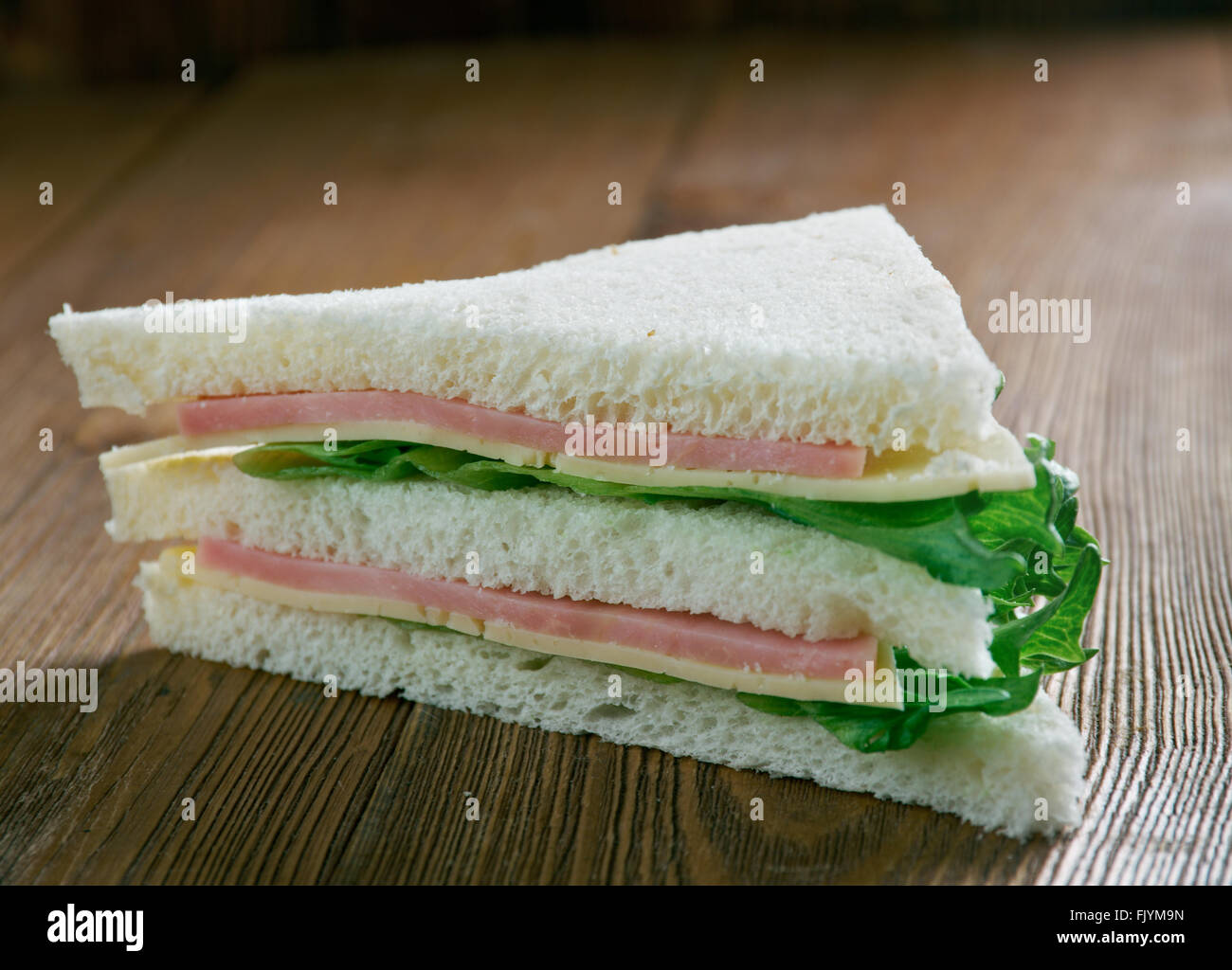 Tramezzino triangular sandwich constructed from two slices of soft ...