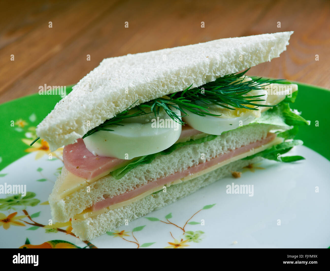 Tramezzino triangular sandwich constructed from two slices of soft ...