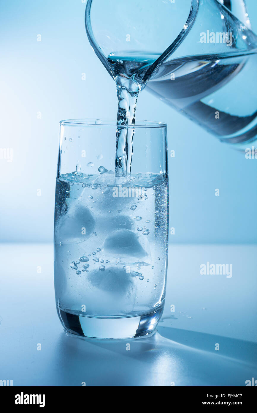 Jug pouring water glass hi-res stock photography and images - Alamy