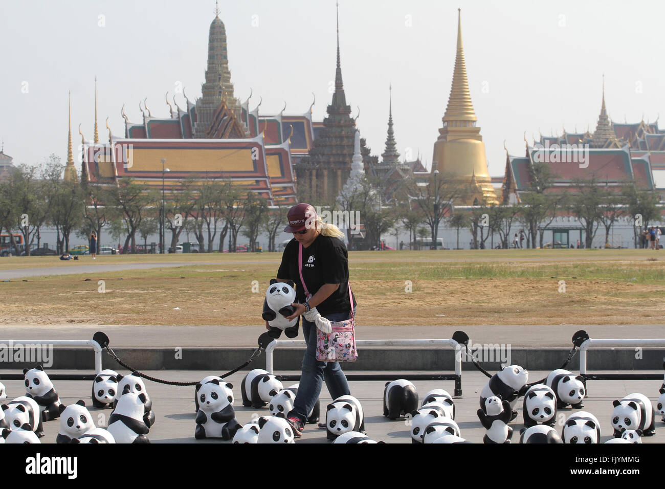 Bangkok, Thailand. 04th Mar, 2016. A man hold a panda during 1600 ...