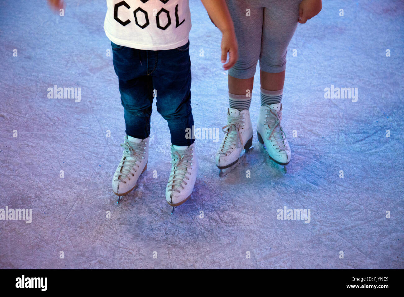 Kids Ice Skating Legs Stock Photo - Alamy