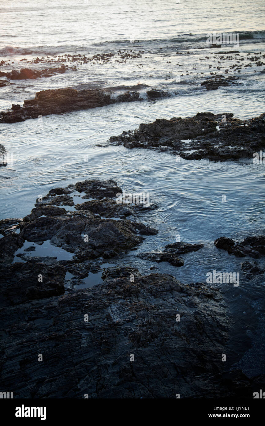 Light on Rocky Waters Stock Photo - Alamy